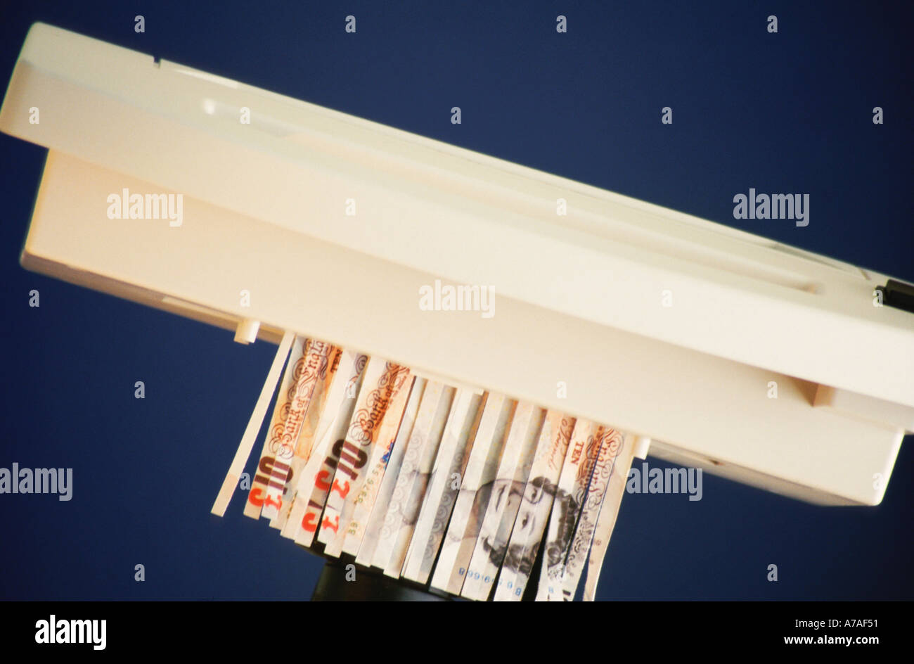 Ten pound notes money being shredded Stock Photo - Alamy