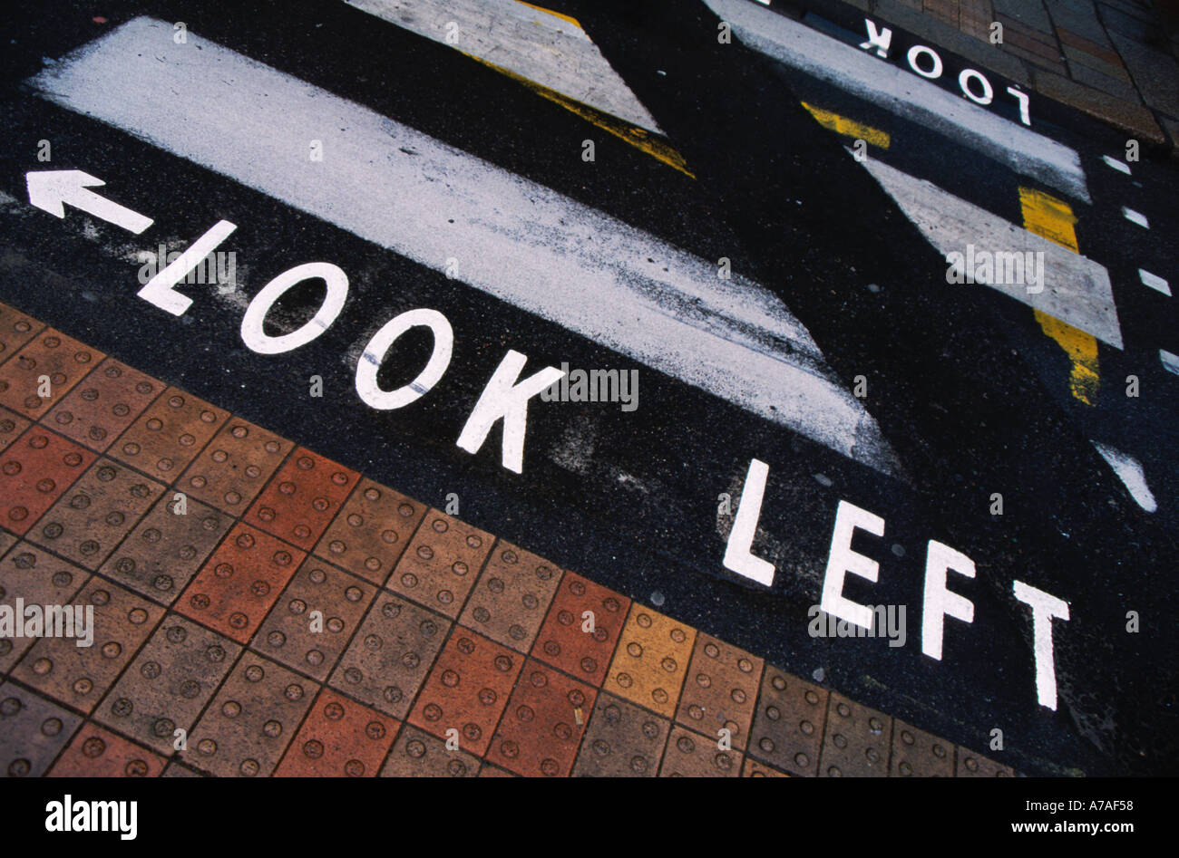 Look Left sign at Zebra Crossing Stock Photo - Alamy