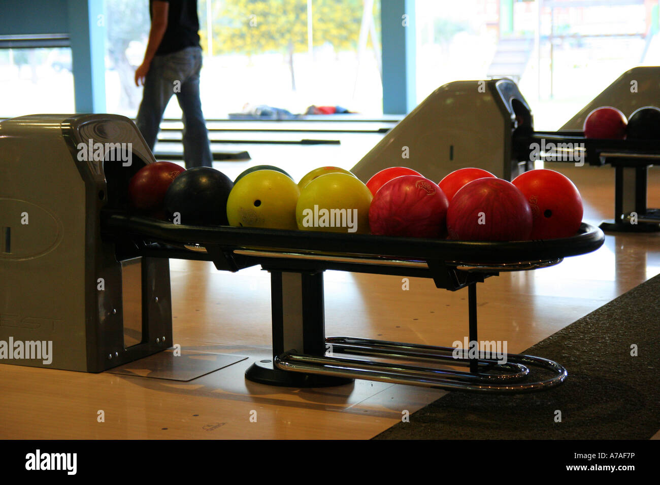 Array of bowling balls of different weights by a bowling lane Stock ...
