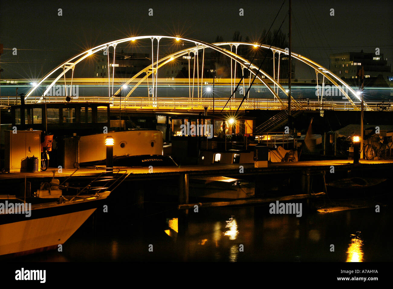 The bridge at night to the KNSM island in Amsterdam Stock Photo - Alamy