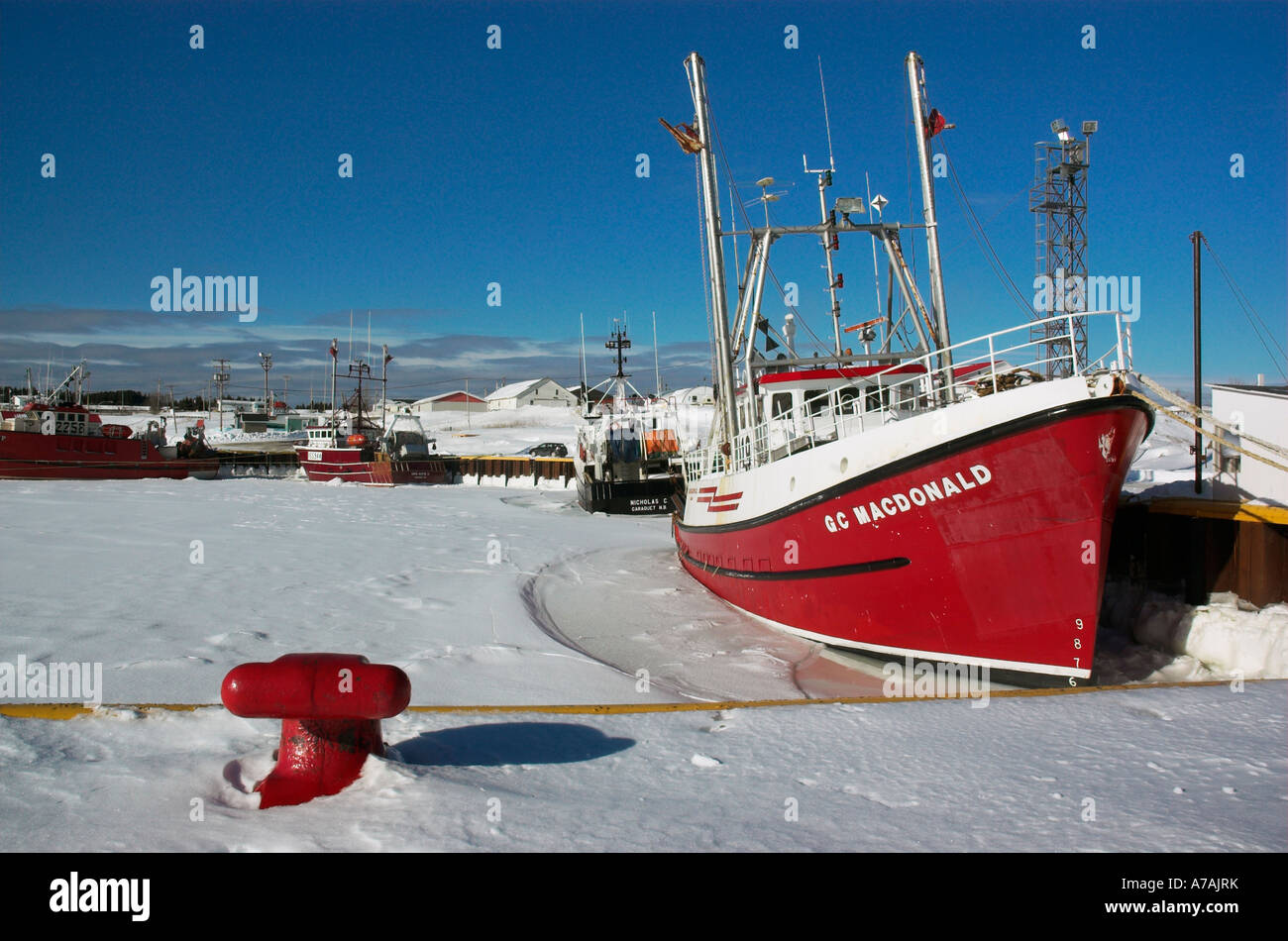 A trawler frozen into the ice at the fishing port of Ste Therese in ...