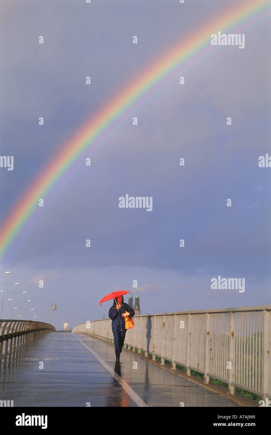 Woman walking water under bridges hi-res stock photography and images ...