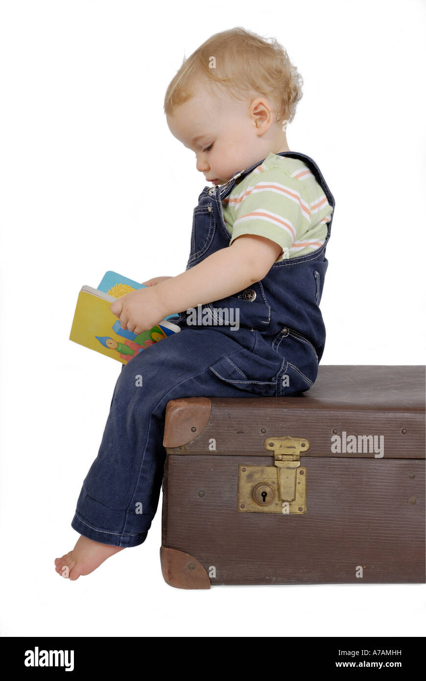 Kid reading comic book Cut Out Stock Images & Pictures - Alamy
