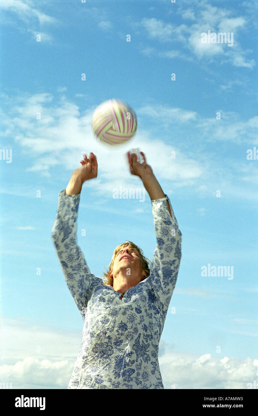 Man trying catch ball hi-res stock photography and images - Alamy