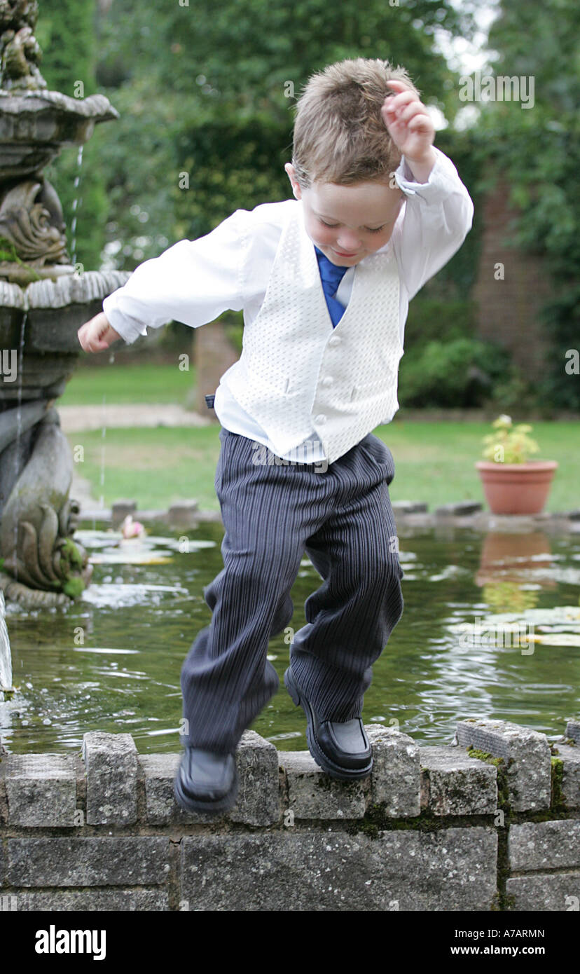 Child jumping off wall hi-res stock photography and images - Alamy