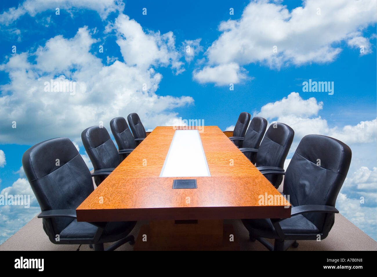 Boardroom table and chairs high in the sky Stock Photo - Alamy