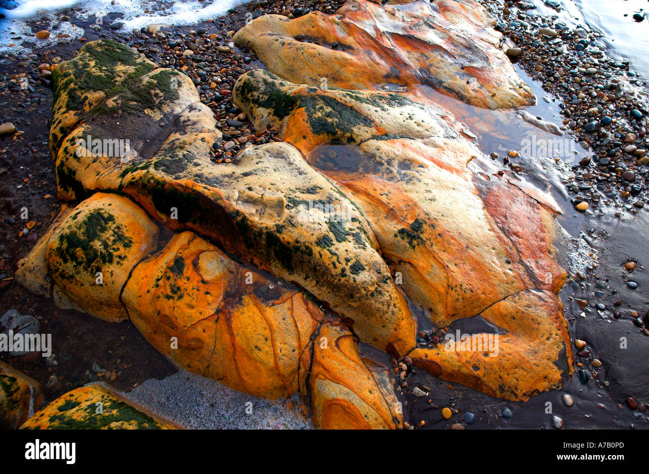 Marbled Rock Formation on Whitby Beach Stock Photo - Alamy