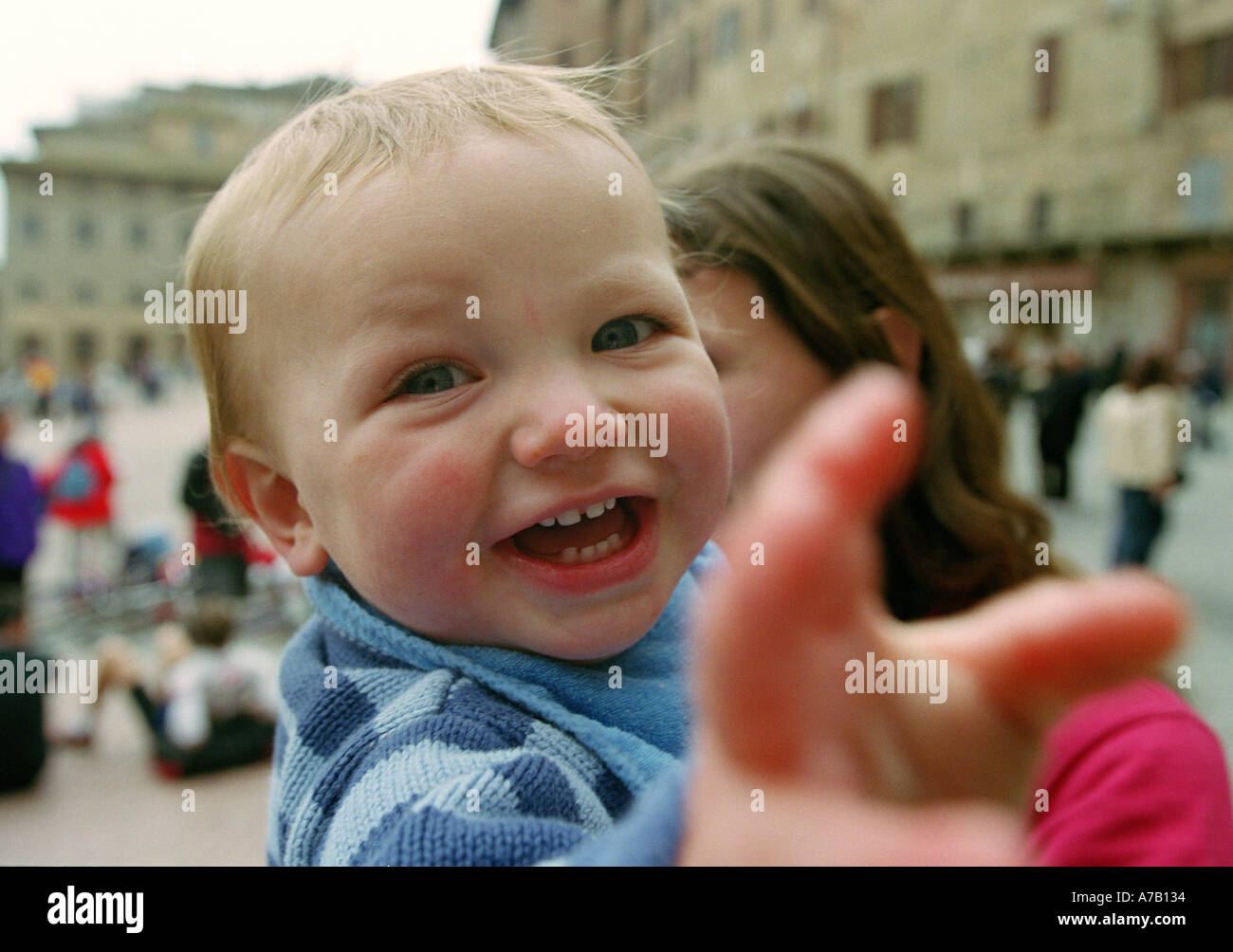 Reaching out towards camera hi-res stock photography and images - Alamy