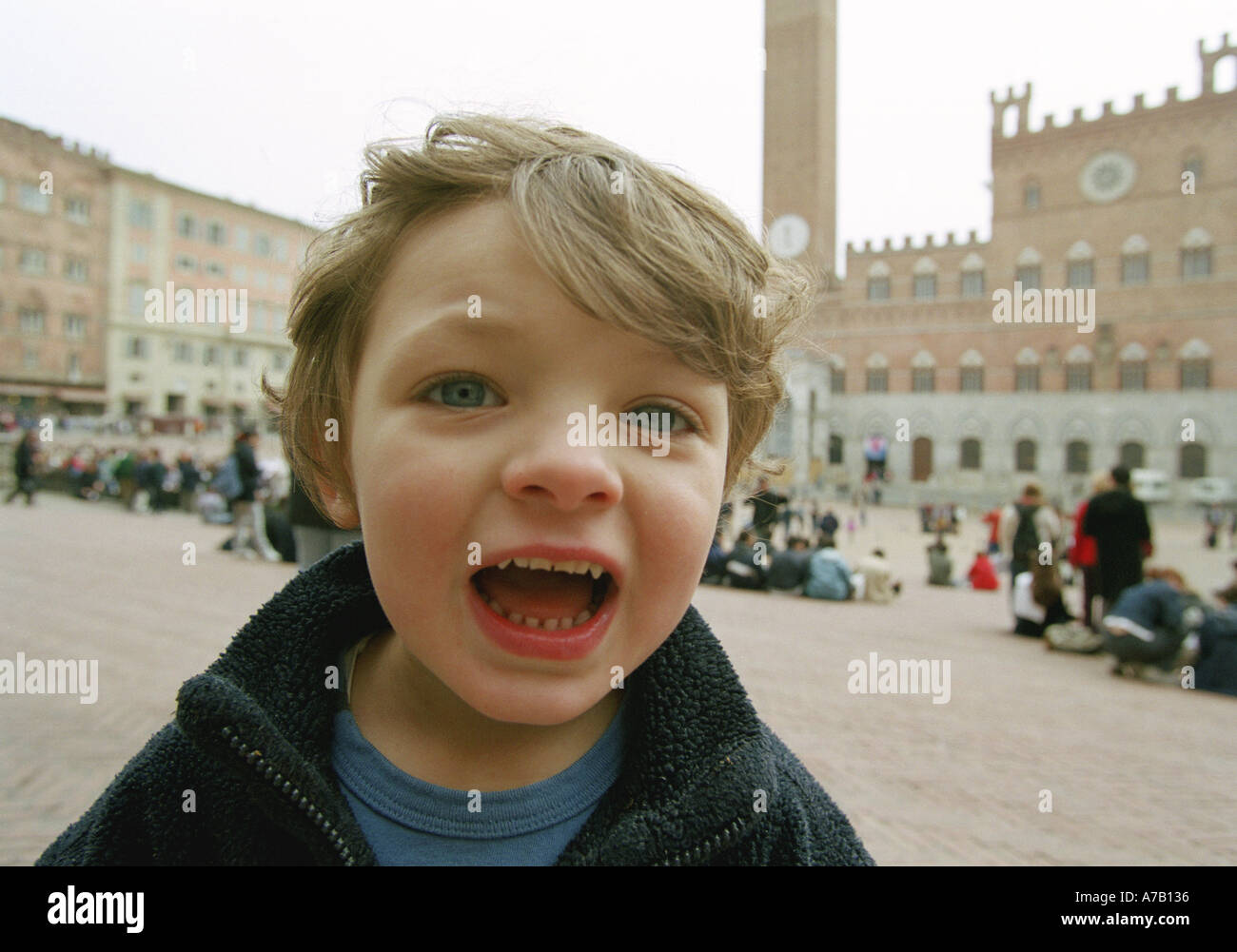 head and shoulder portrait of young boy shouting to the camera Stock ...