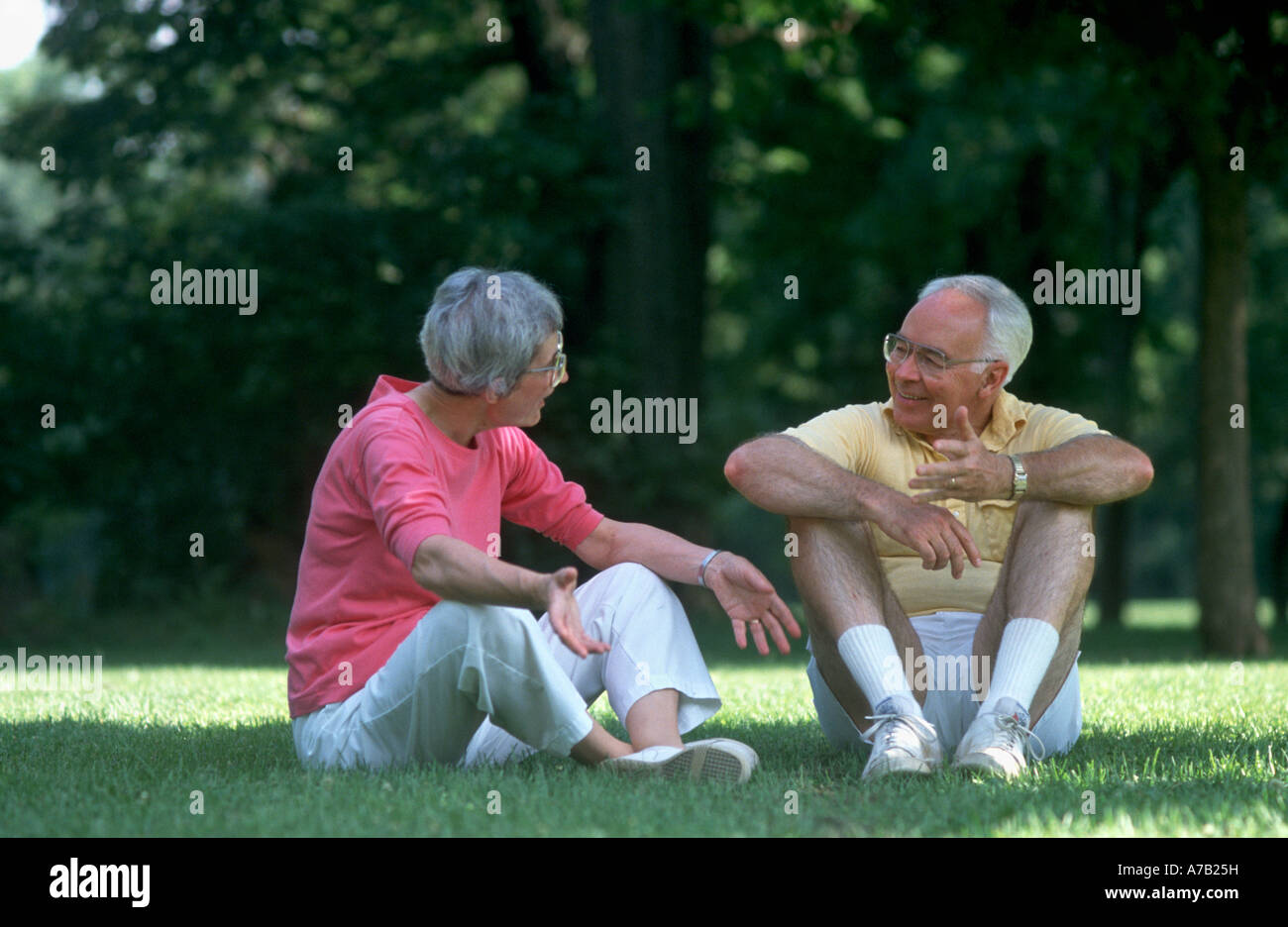 Mature Couple Enjoying Sunny Afternoon In The Park Stock Photo Alamy
