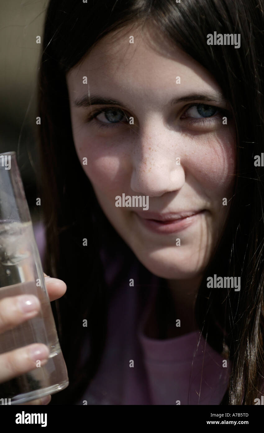 Teenage girl drinking alcohol on a barge trip Stock Photo - Alamy