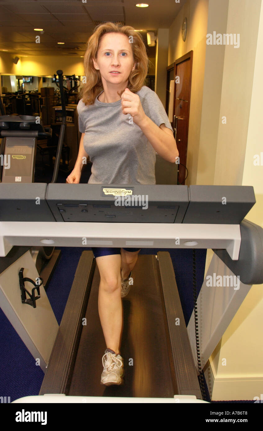 Lady running on treadmill at Champneys Springs Health Resort near Ashby ...