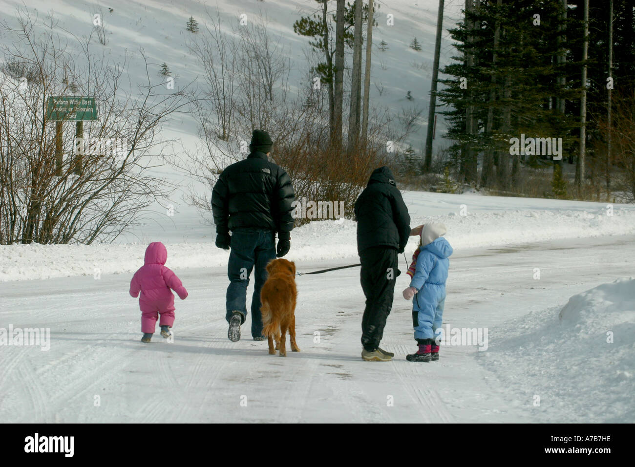 Young Family going for a walk Stock Photo - Alamy