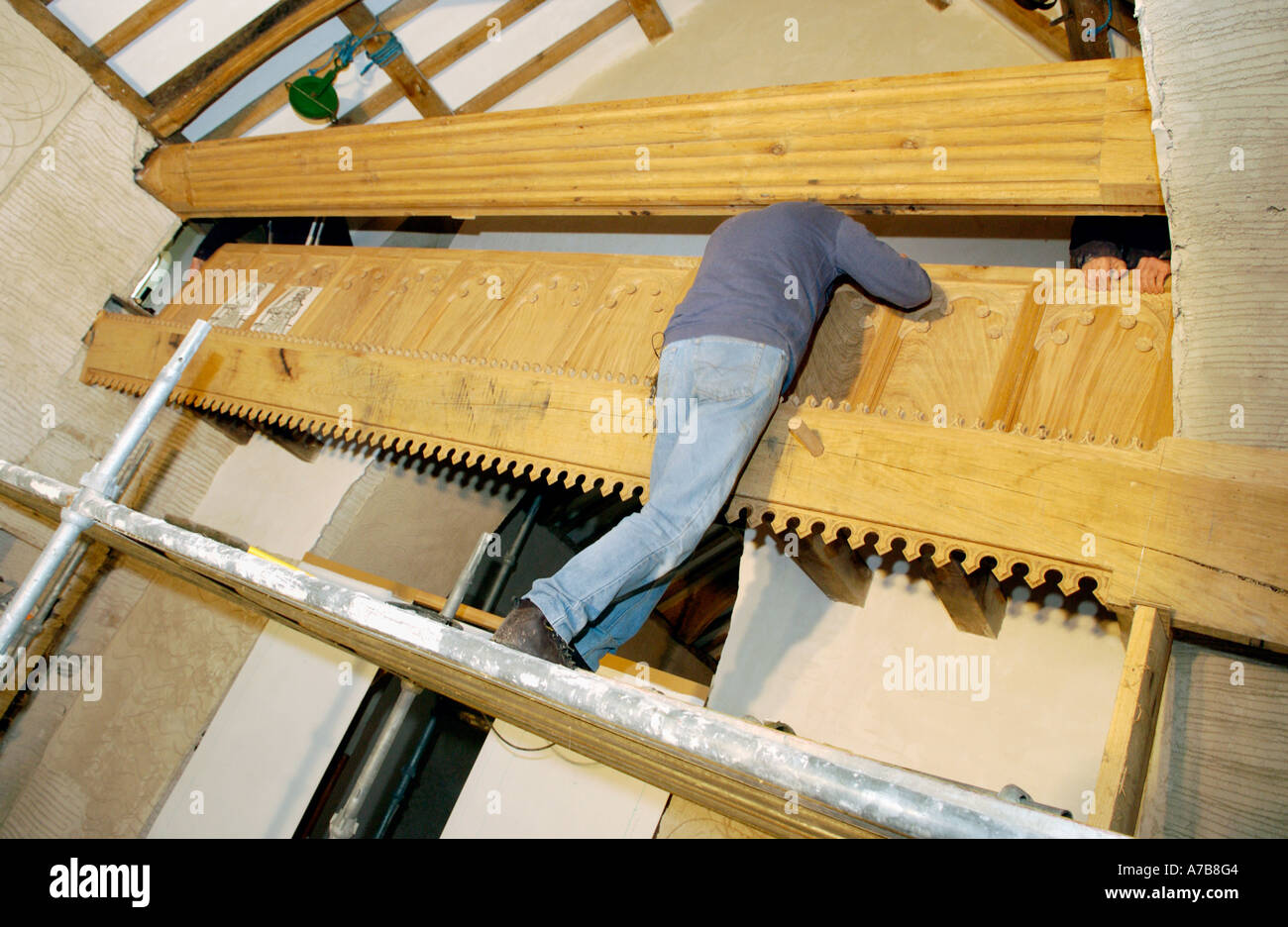 Craftsmen installing Rood Loft at St Teilos Church being rebuilt at ...