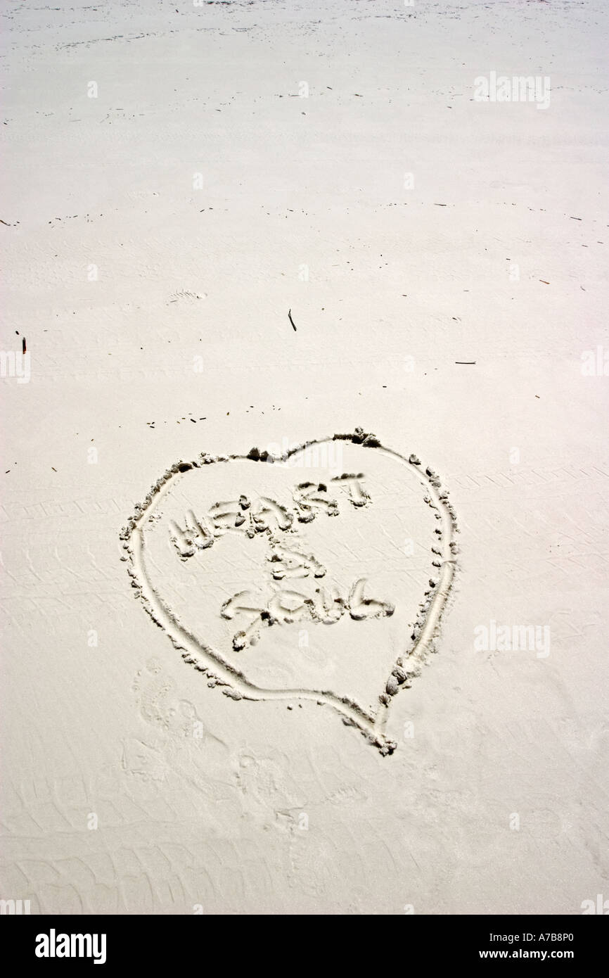 Love heart writing in the sand Stock Photo - Alamy