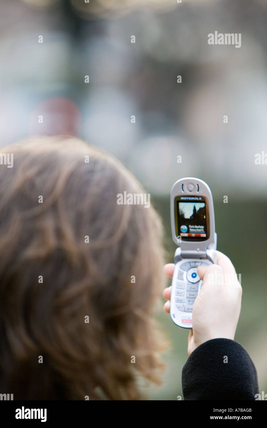 Leeds person taking camera phone picture Stock Photo - Alamy