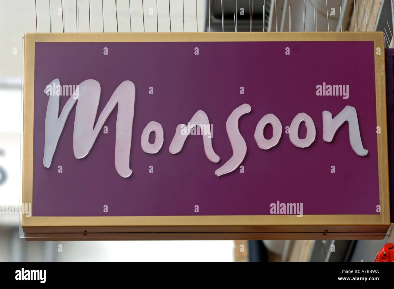 Monsoon shop sign, Britain UK Stock Photo - Alamy