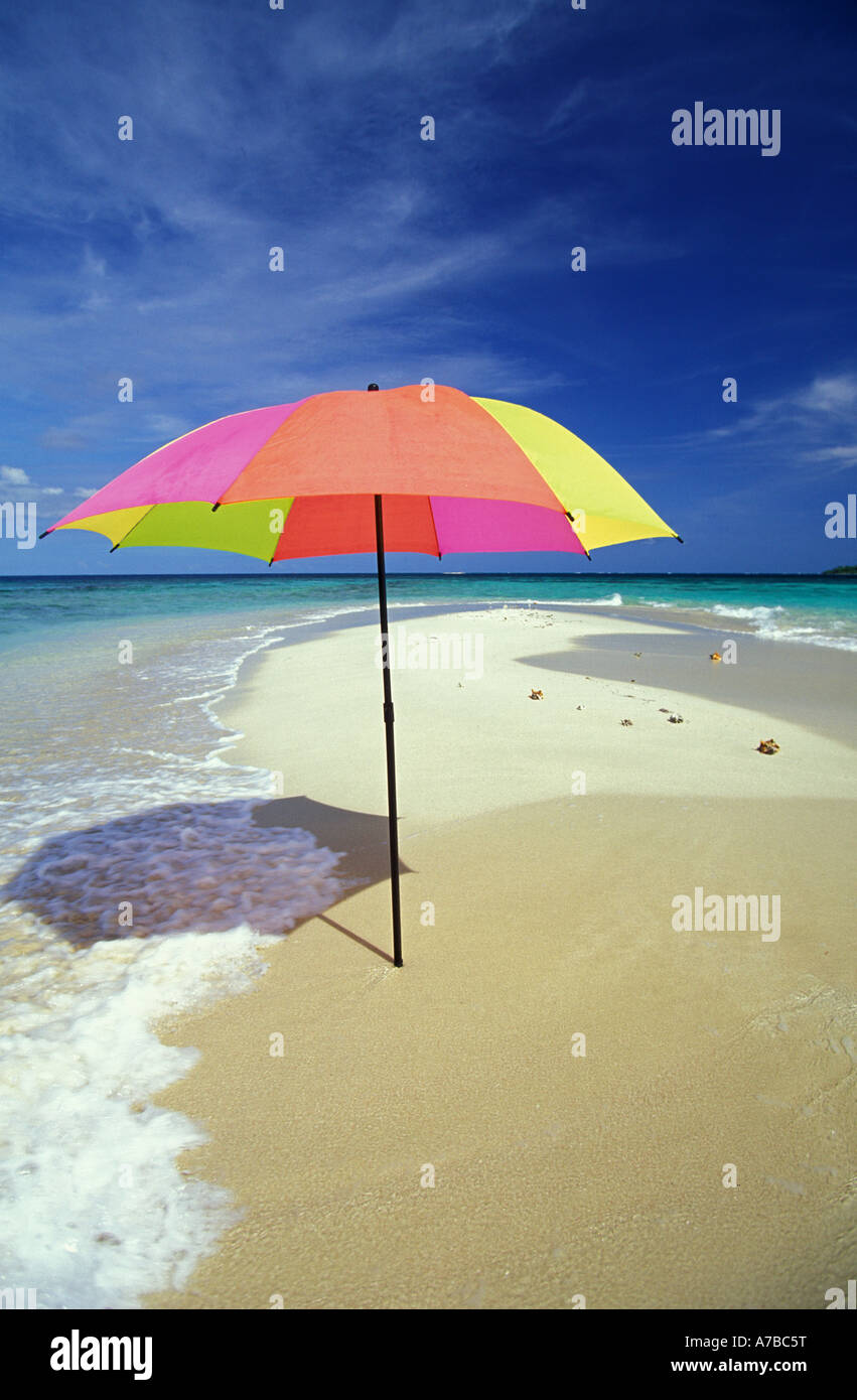 Beach umbrella on sandbar in the Caribbean Stock Photo - Alamy