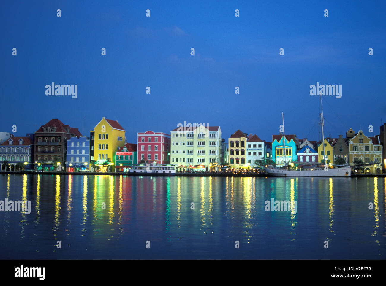 Dutch building line the Handelskade in Willemstad, Curacao at night ...