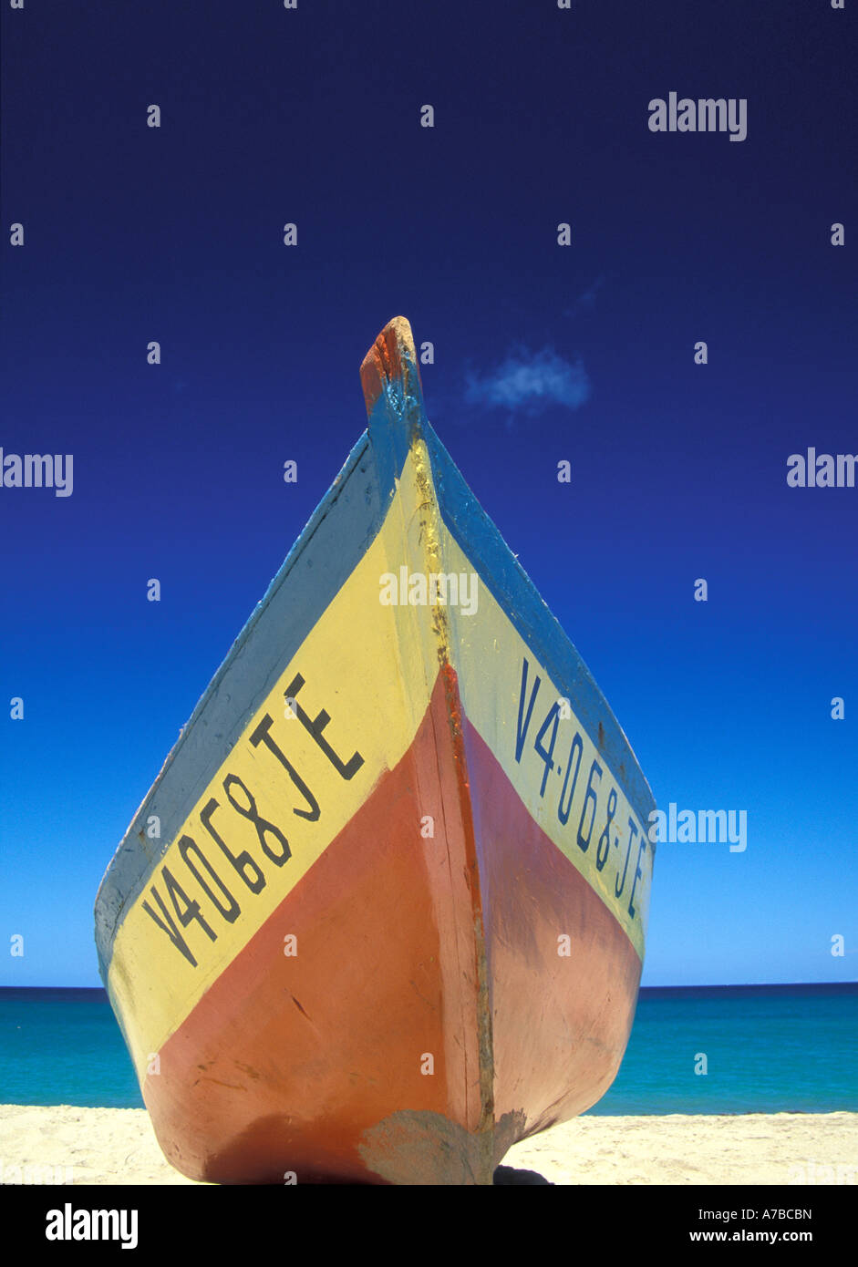 colorful wooden boat on beach in Nevis Stock Photo - Alamy