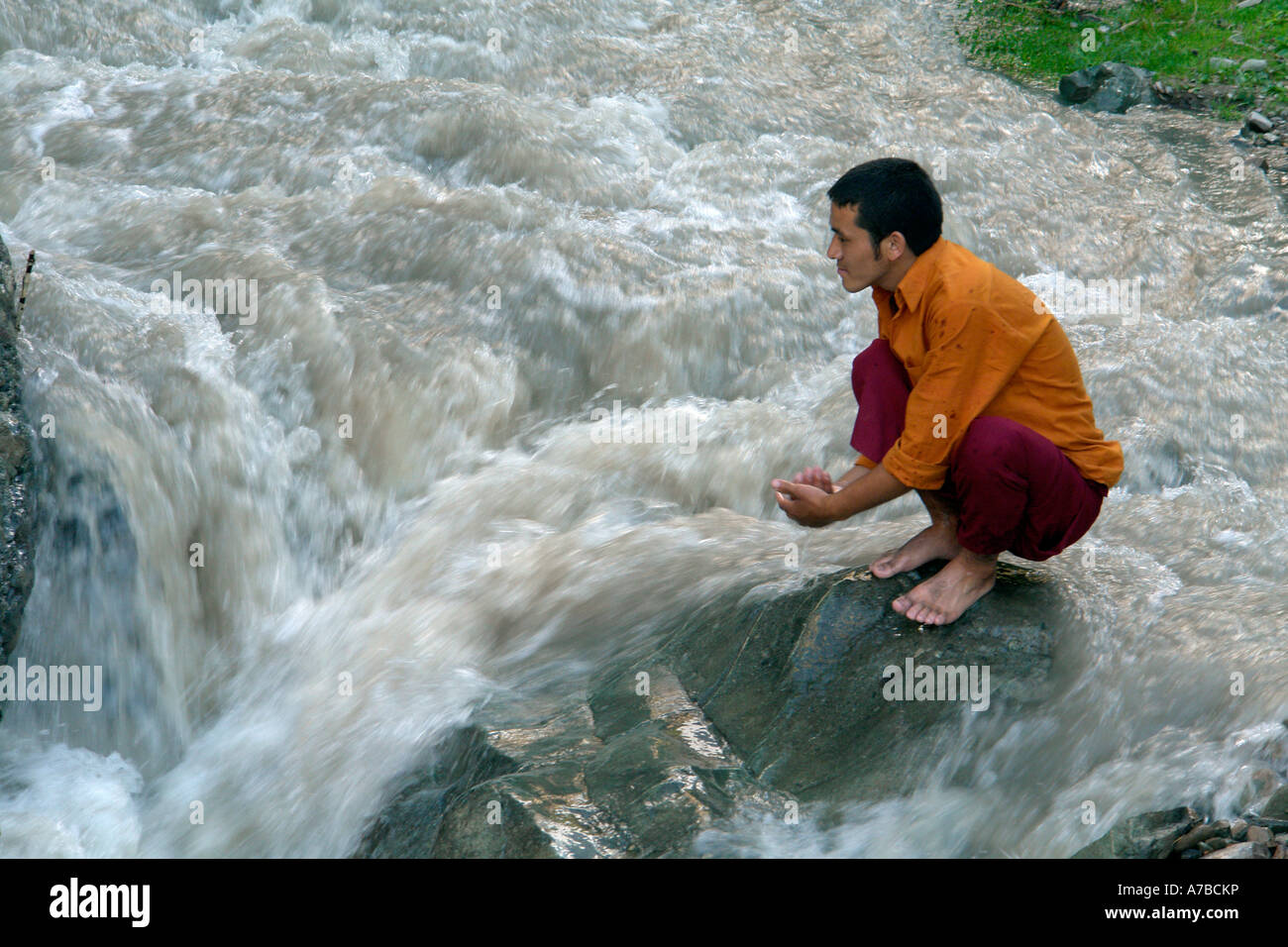 monk washing indus river valley ladakh Stock Photo - Alamy