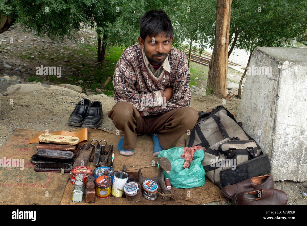 street shoe cleaner Stock Photo - Alamy