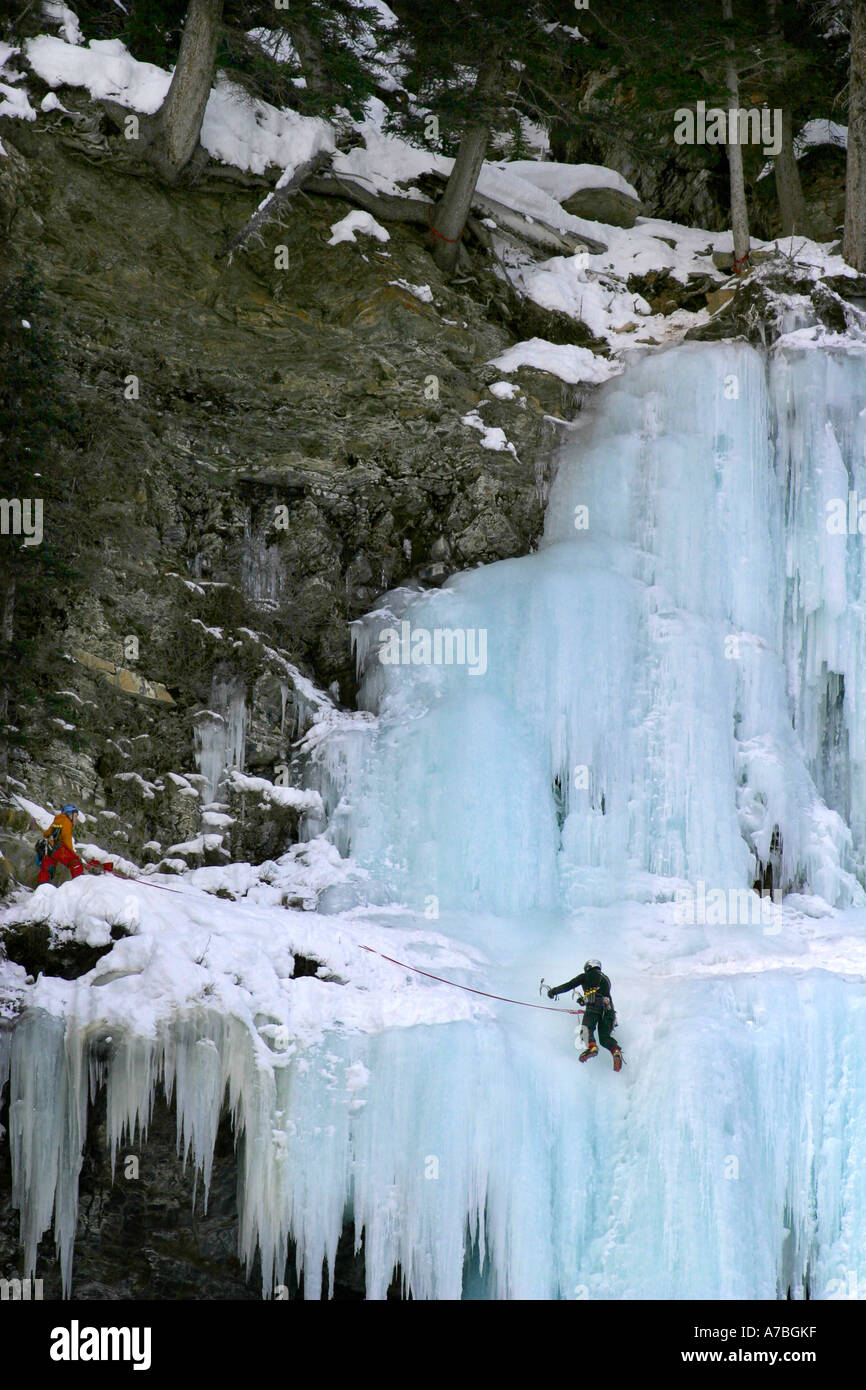 Ice falls climber Stock Photo - Alamy