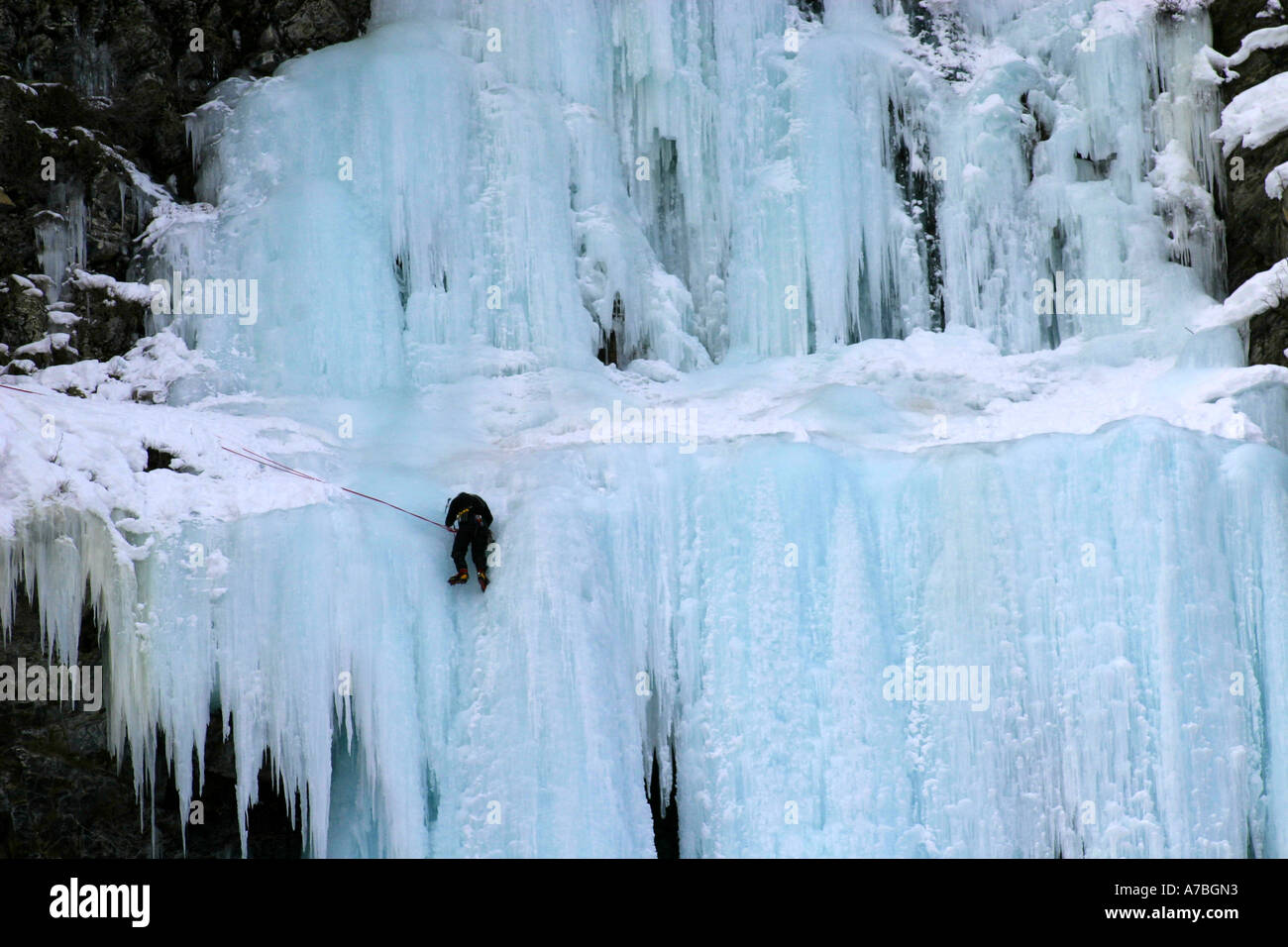Ice falls climber Stock Photo - Alamy