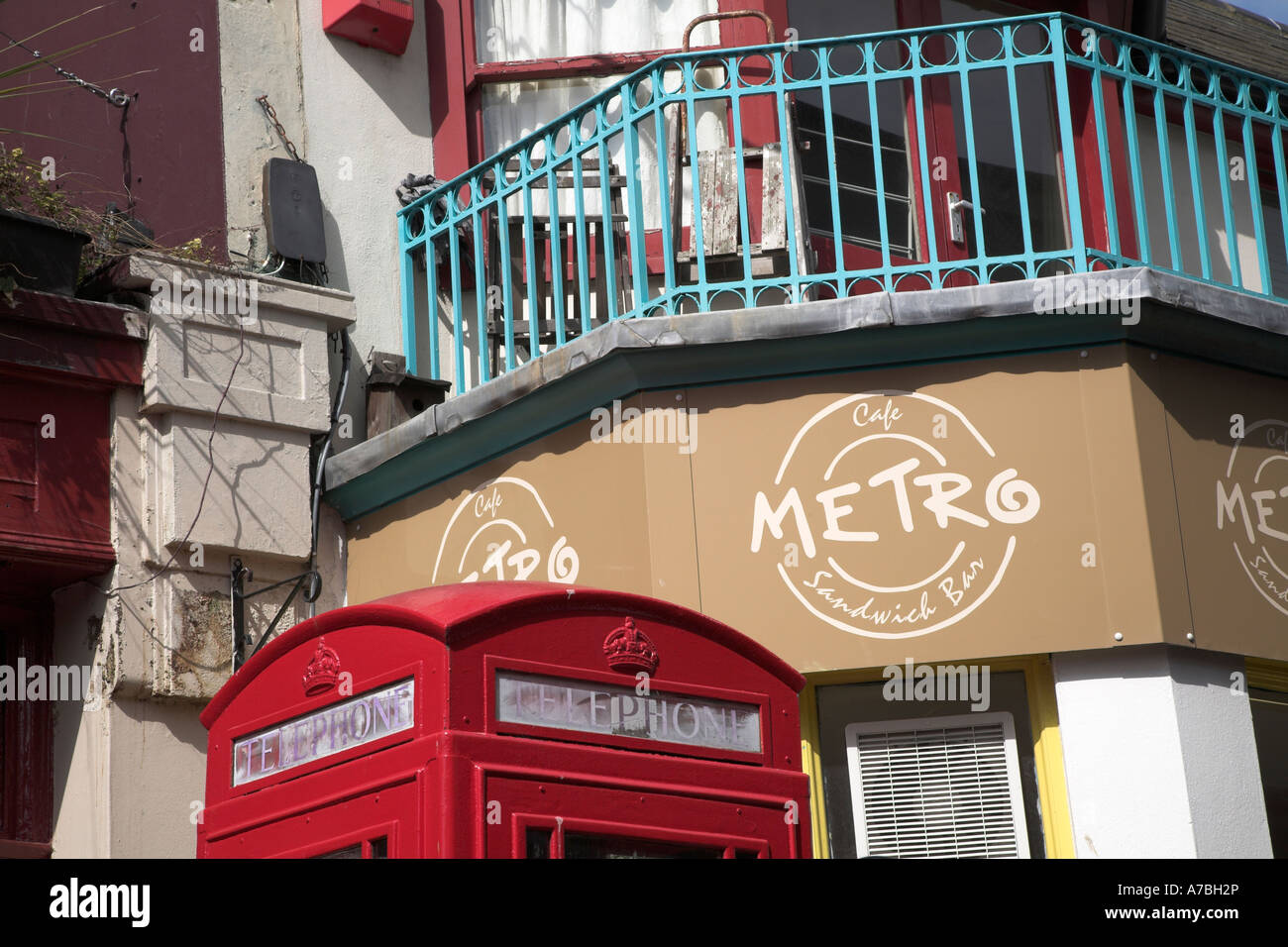 Red telephone box and coffee shop front Stock Photo - Alamy