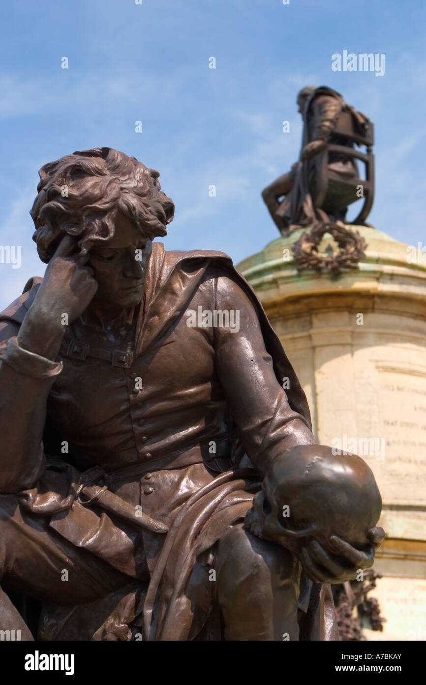 Statue of Hamlet with a statue of William Shakespeare in the background ...