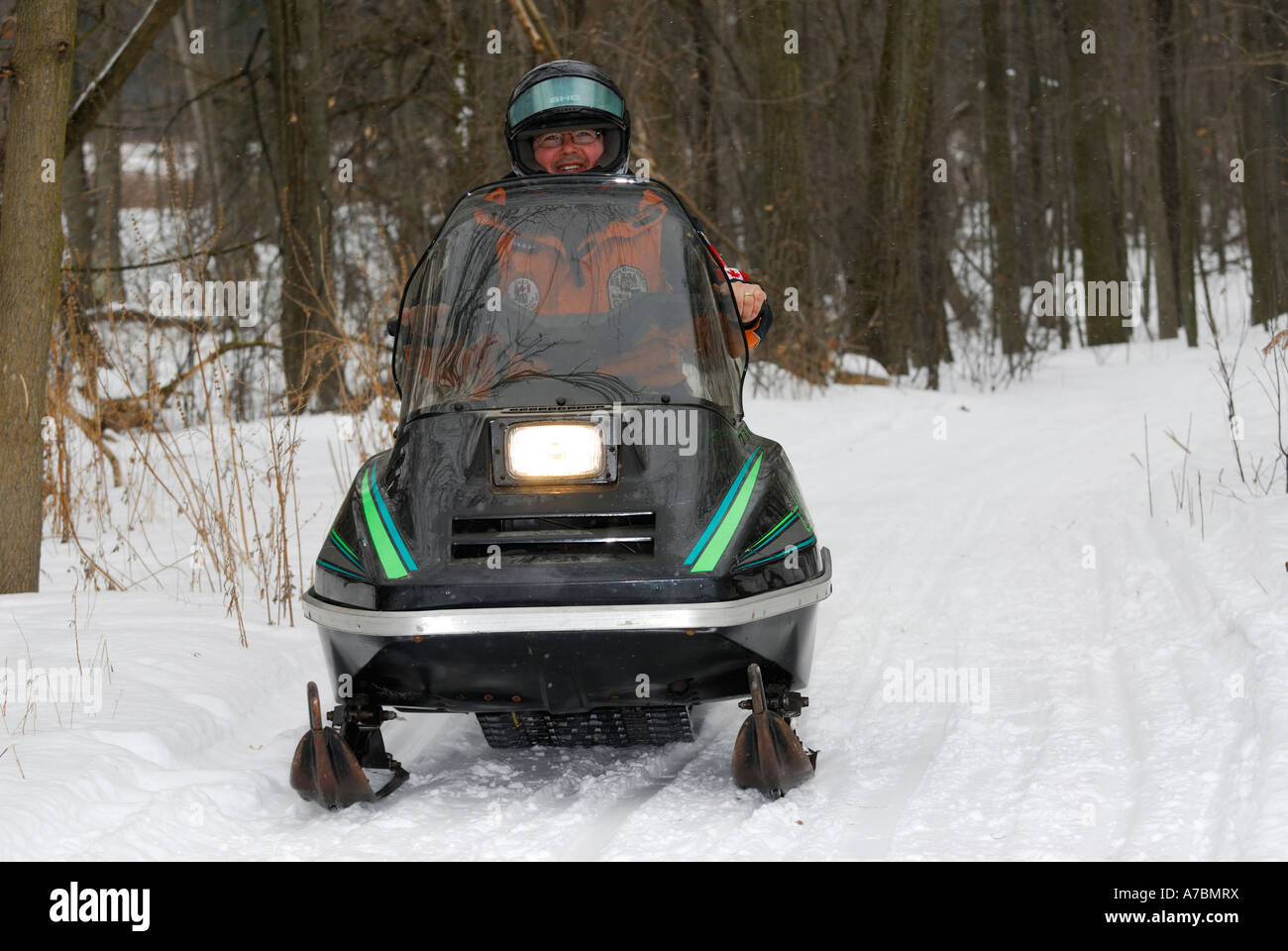 Man riding snowmobile on hi-res stock photography and images - Alamy