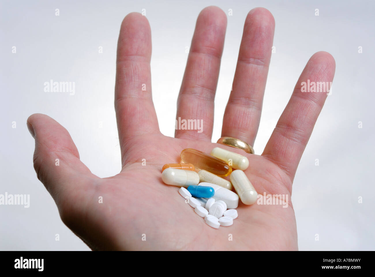 Hand assortment pills hi-res stock photography and images - Alamy