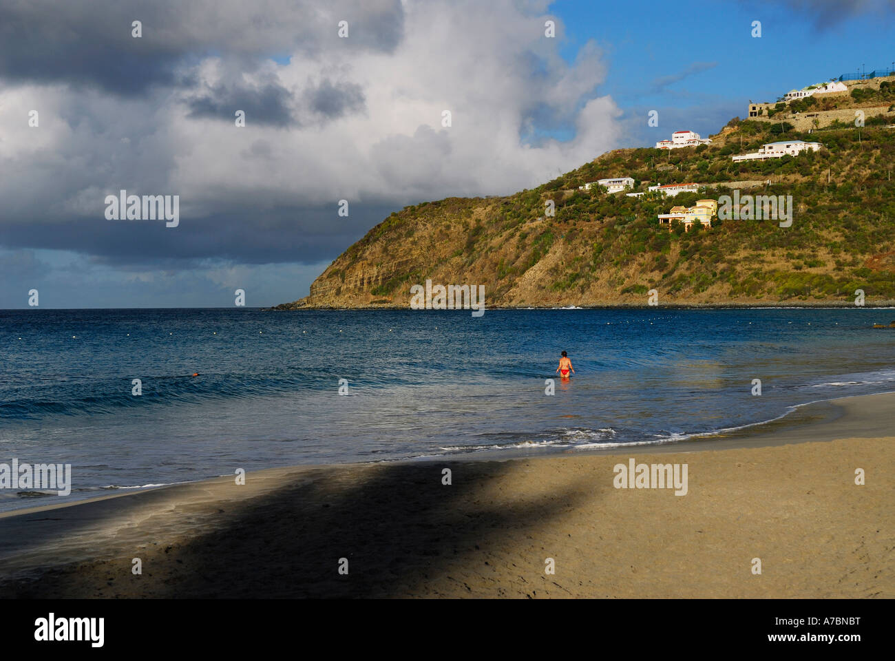 Couple taking an early morning swim in the Caribbean Sea Stock Photo ...