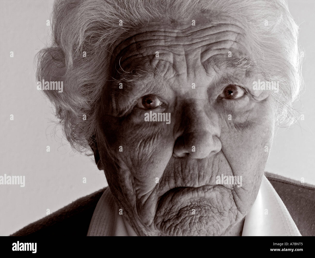 Black and white close up portrait of apprehensive elderly lady Stock ...