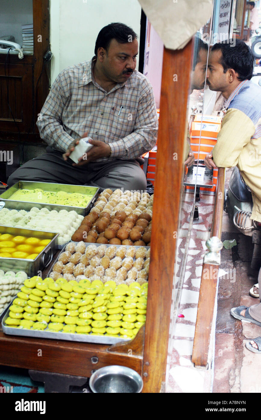 Traditional Indian sweets being sold in the warren-like backstreets of ...