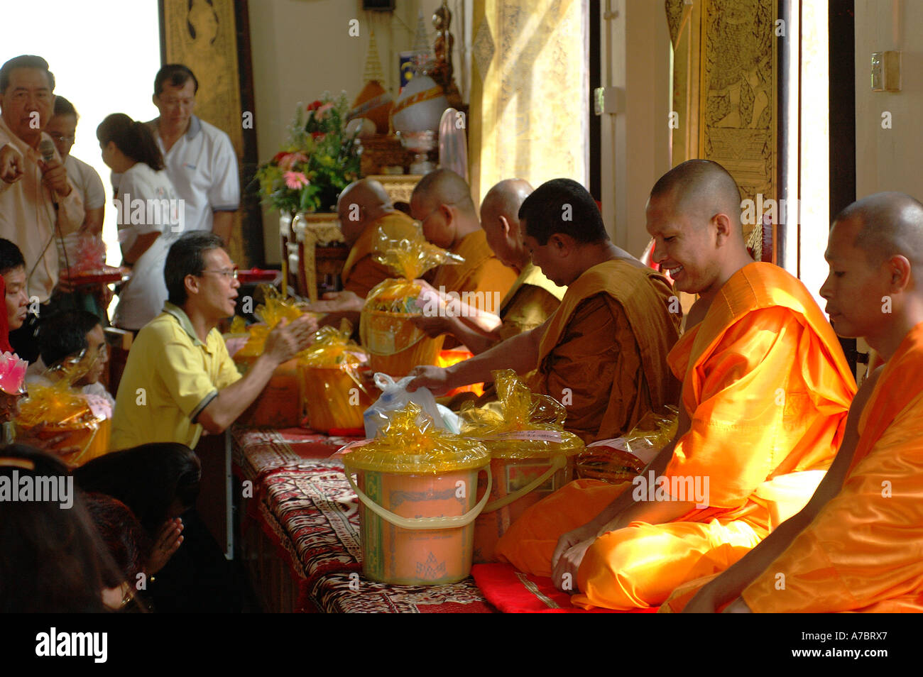 Buddhist monk holding prayers Stock Photo - Alamy
