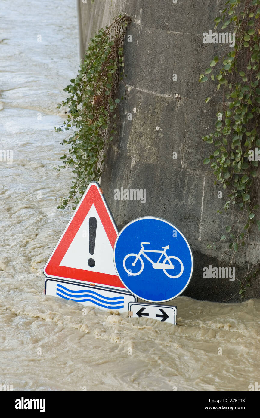 flooded bicycle sign and exclamation mark sign Stock Photo - Alamy