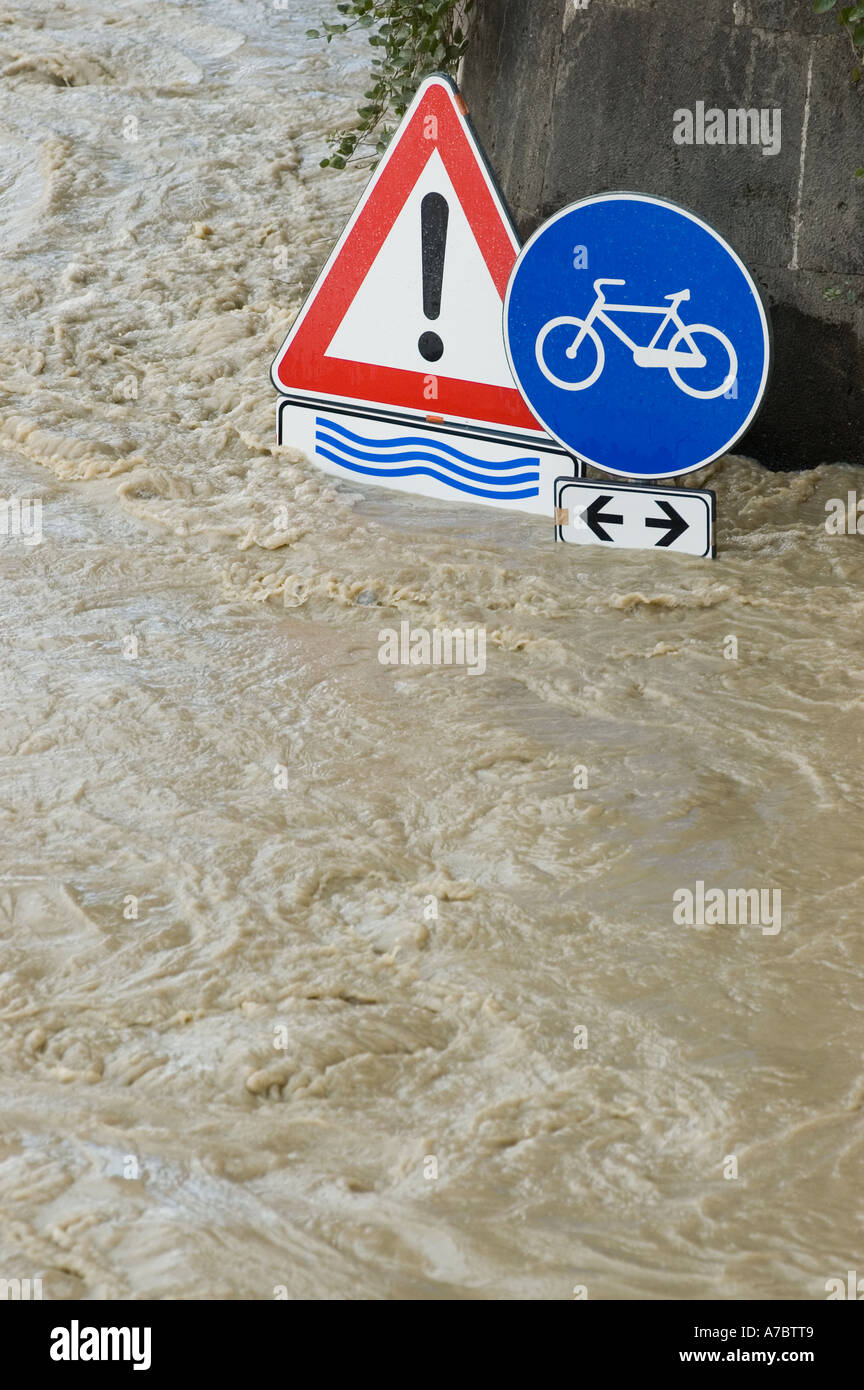 flooded bicycle sign and exclamation mark sign Stock Photo - Alamy