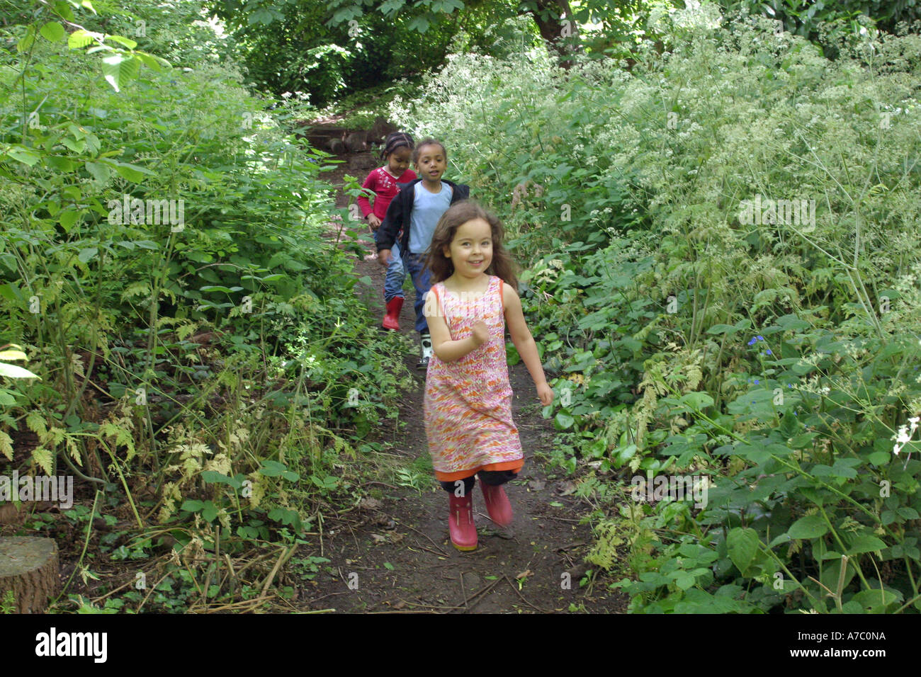 Nursery school children on an outing in the park Stock Photo - Alamy