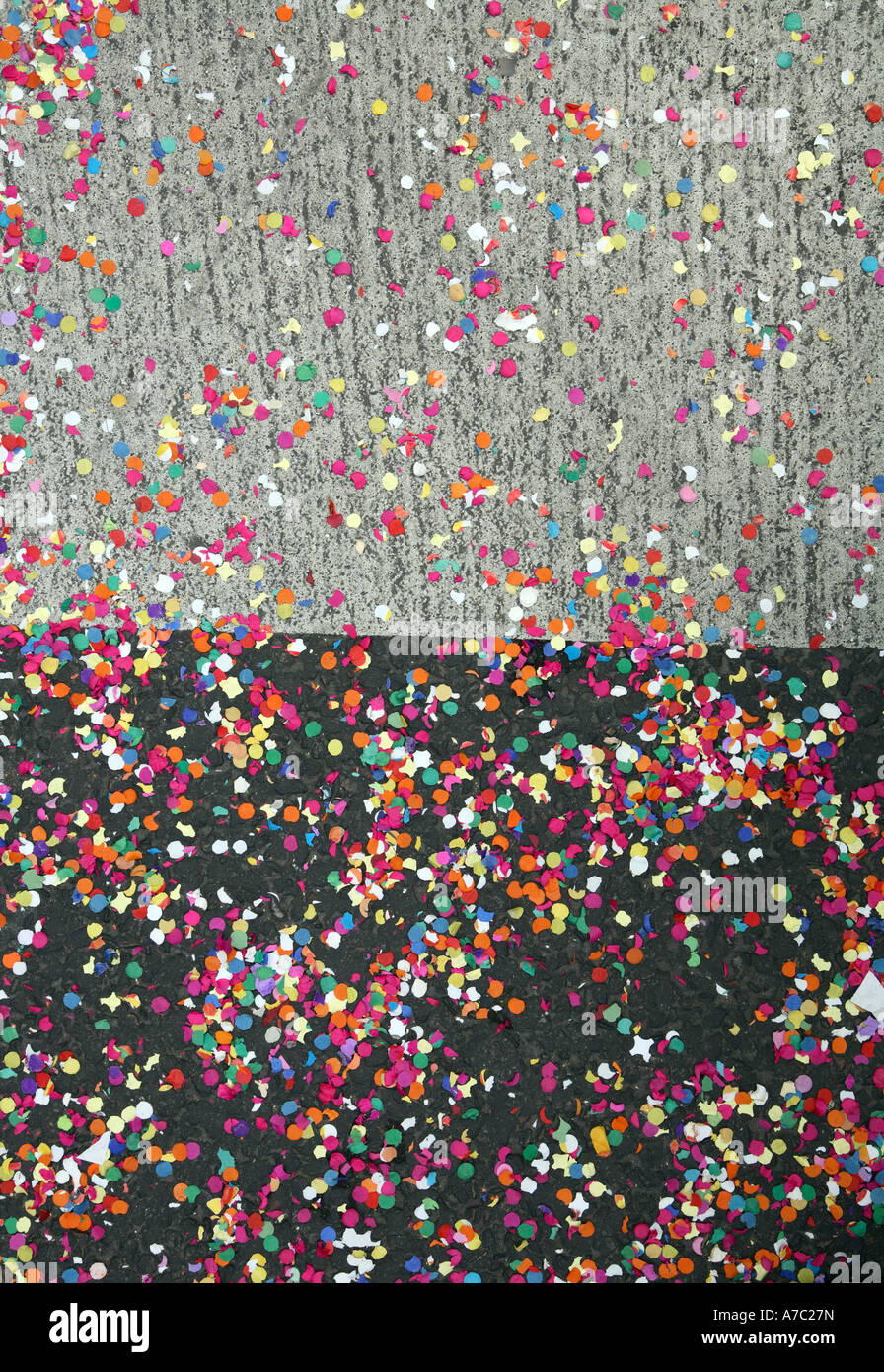 confetti on the road after carnival parade Stock Photo - Alamy