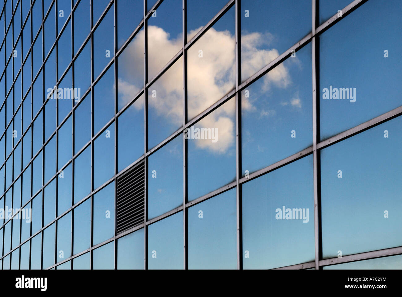 Sky reflected in glass windows Milton Keynes Stock Photo - Alamy