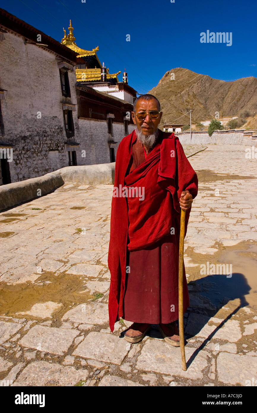 Old monk at Tashilumpo Monastery one of the largest and most beautiful ...