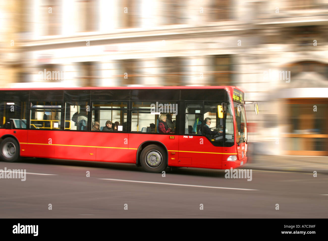 London bus with passengers approaching Trafalgar Square London United ...