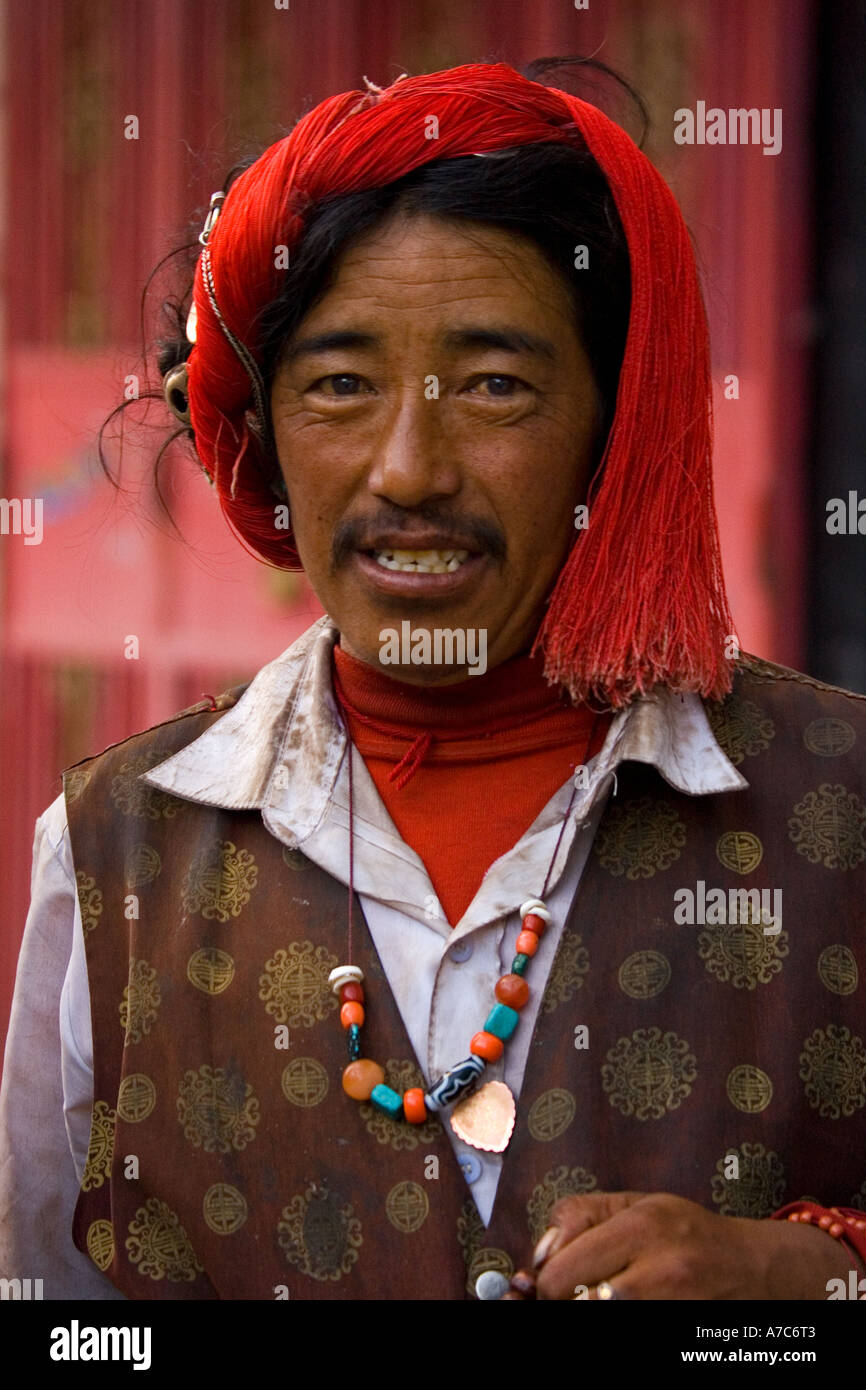 Tibetan man in front of the Jhokang temple in Old Lhasa Tibet China ...