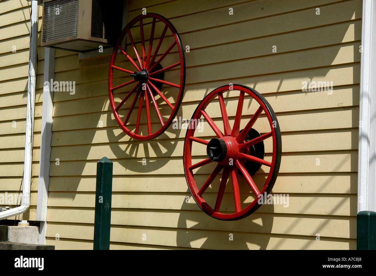 Red wheels on the wall of store, New Hope Bucks County Pennsylvania USA ...