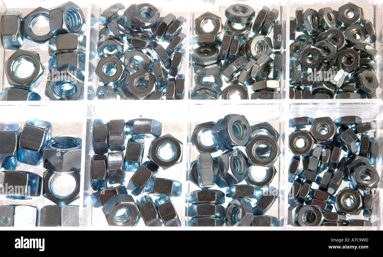 Nuts and bolts with bright light Stock Photo - Alamy