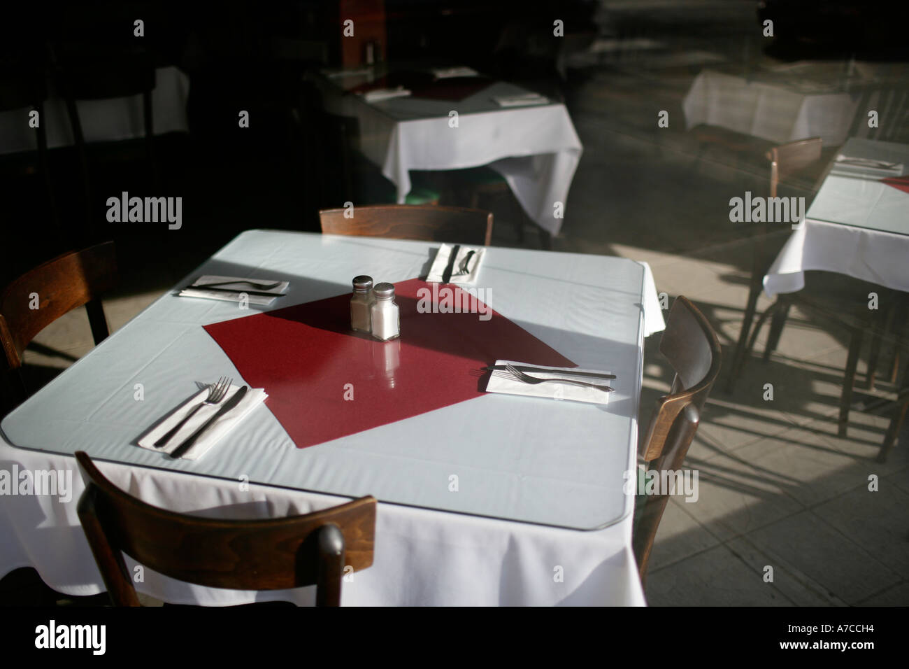Restaurant empty closed with tables and settings Stock Photo - Alamy