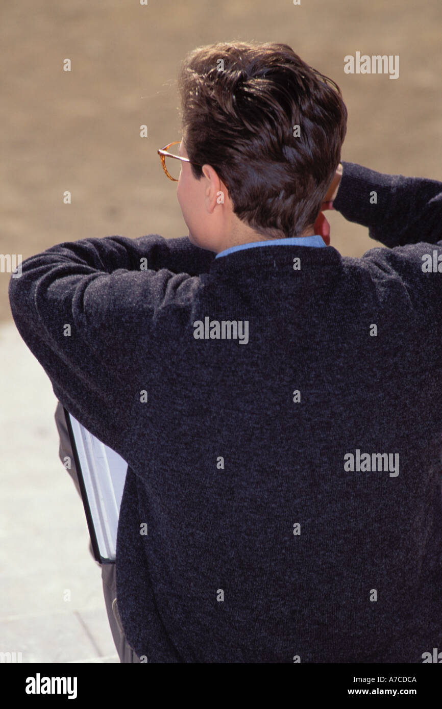 Student on steps Stock Photo - Alamy