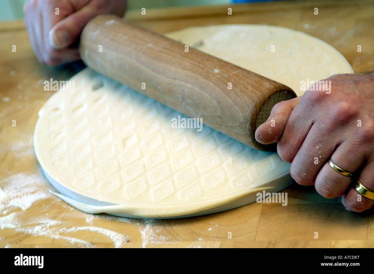 Rolling pastry on a lattice cutter Stock Photo - Alamy