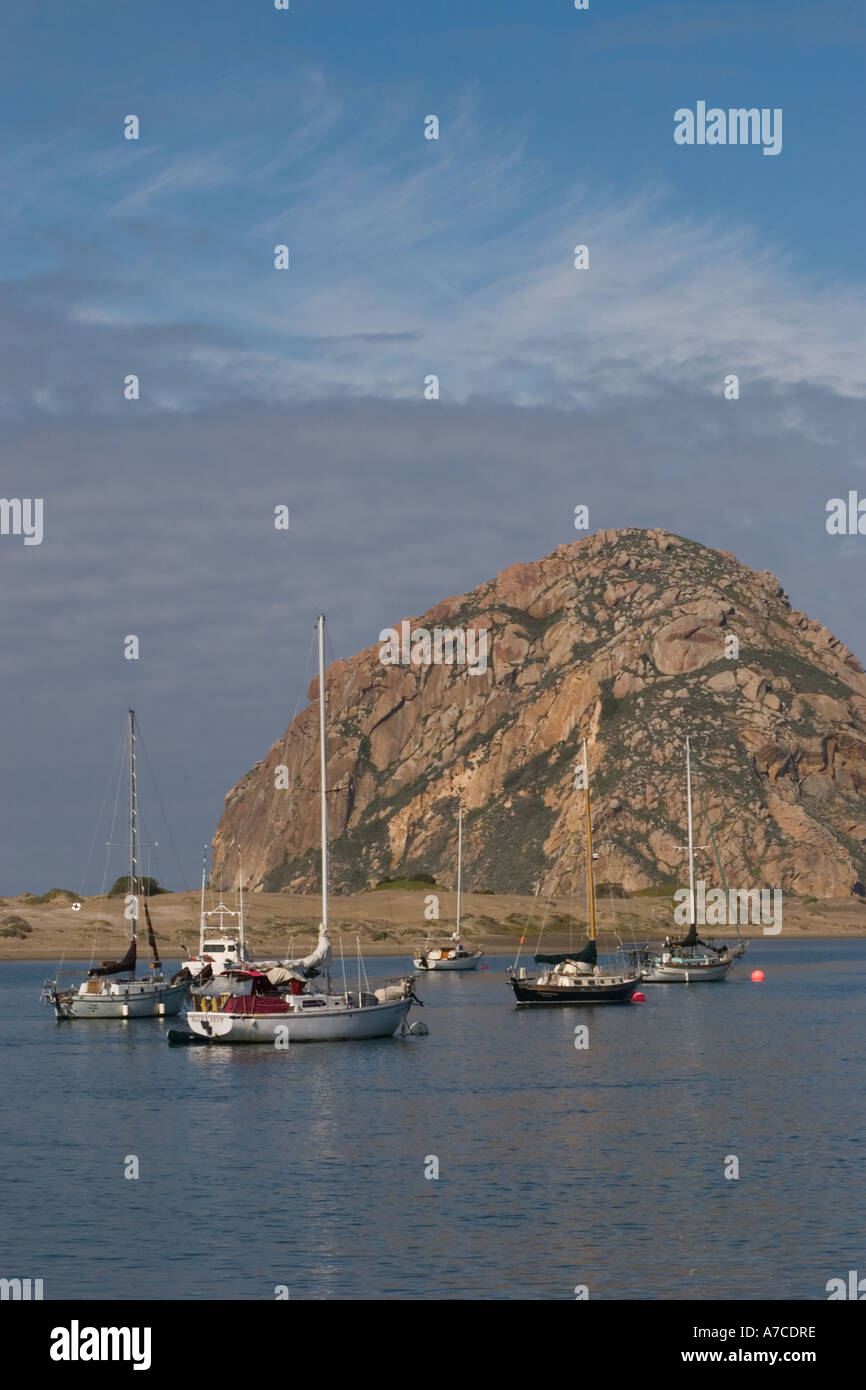 Boats anchored in Morro Bay, California, with Morro Rock in background ...